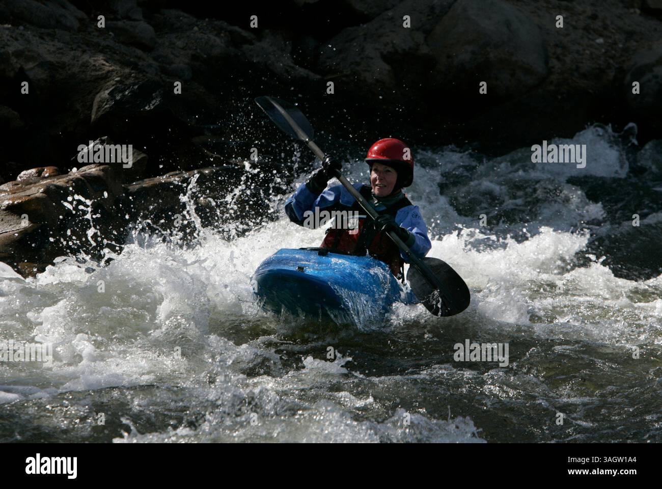 Kayakers paddle through a section of the Kern River called Big Daddy ...