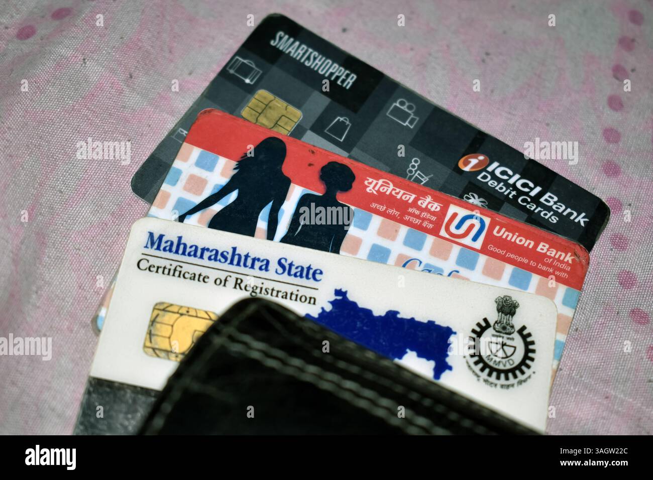 Several bank cards and an official registration certificate are ...