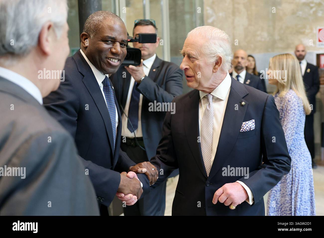 Foreign Secretary David Lammy greets King Charles III at the Mattatoio ...