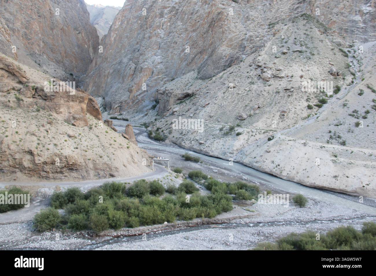 Winding river flows through stunning rocky terrain in Leh Ladakh ...
