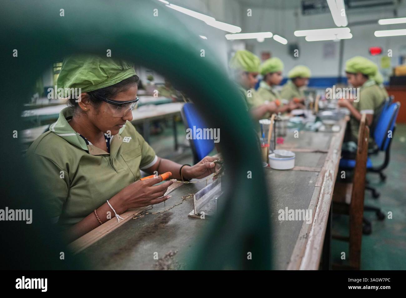 Workers are seen in a handmade jewelry factory at the Katunayake export ...