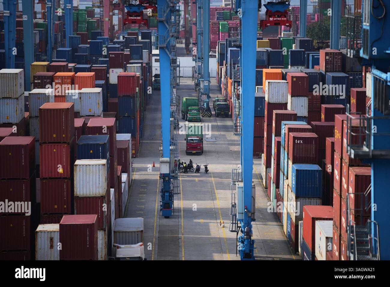 Containers are stacked at IPC Container Terminal at Tanjung Priok Port ...