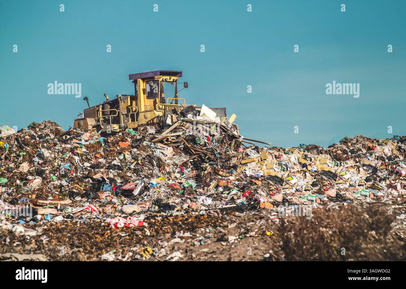 Dozer garbage dumping ground hi-res stock photography and images - Alamy