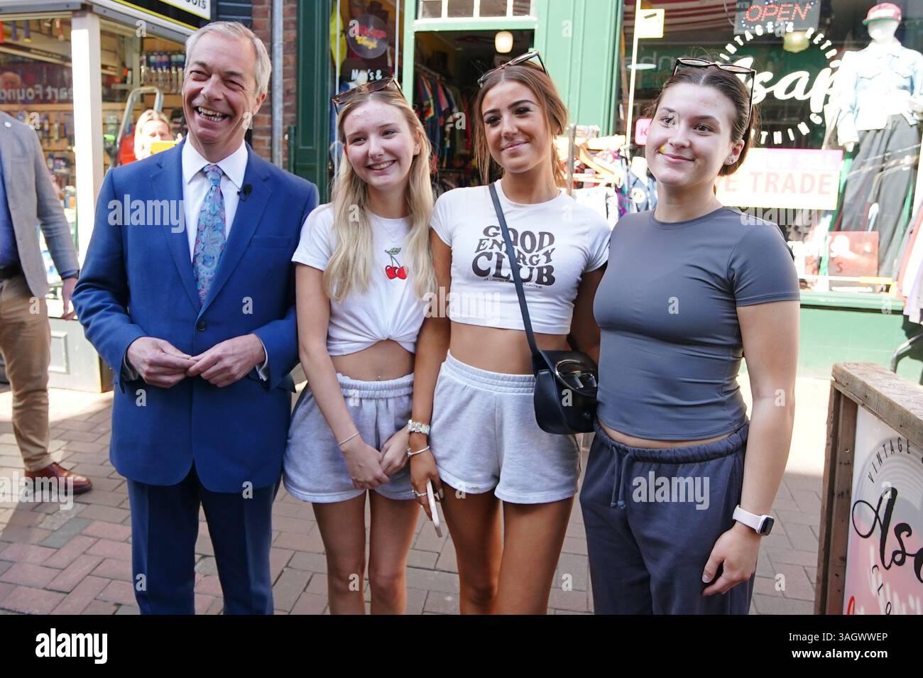 Reform UK leader Nigel Farage meets members of the public during a ...