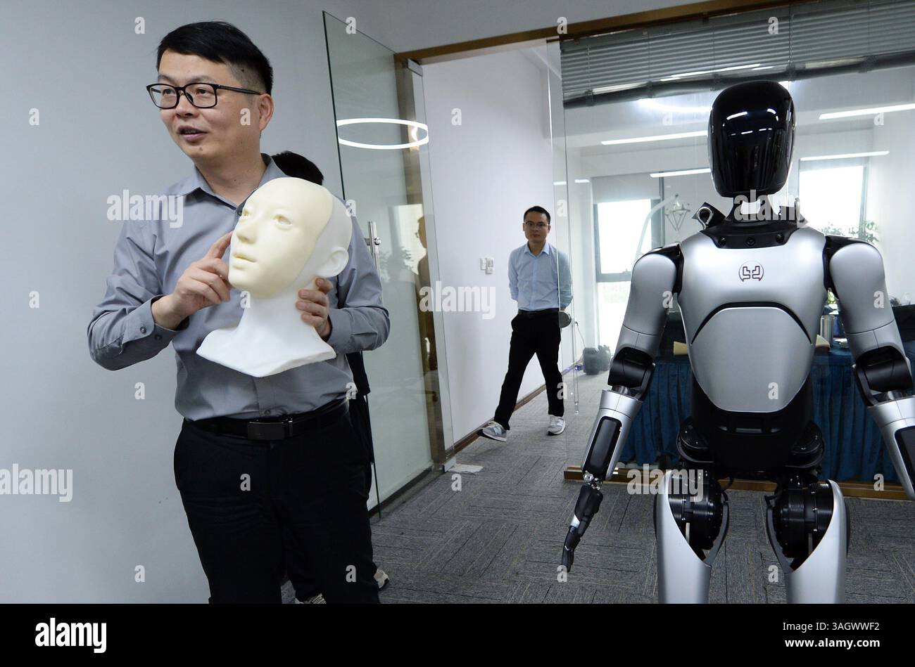 Shenzhen, China's Guangdong Province. 27th Mar, 2025. A staff member ...
