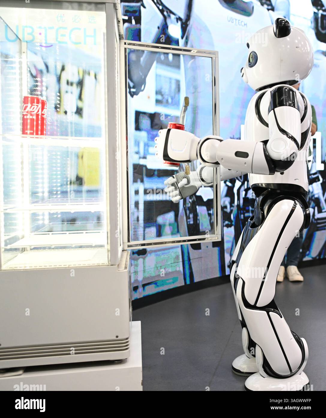 Shenzhen, China's Guangdong Province. 26th Mar, 2025. A humanoid robot ...
