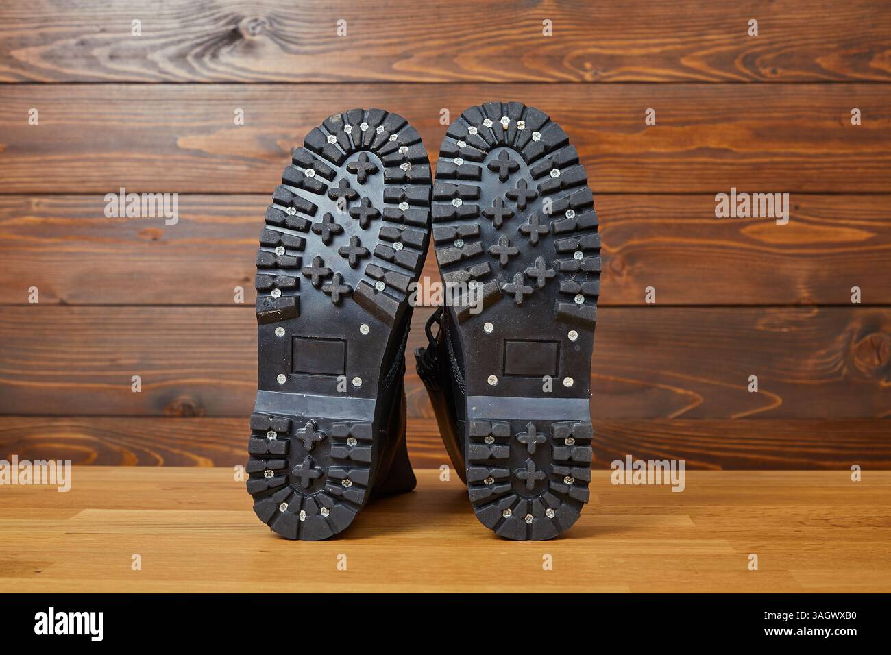 Leather boots sole with screws Stock Photo - Alamy