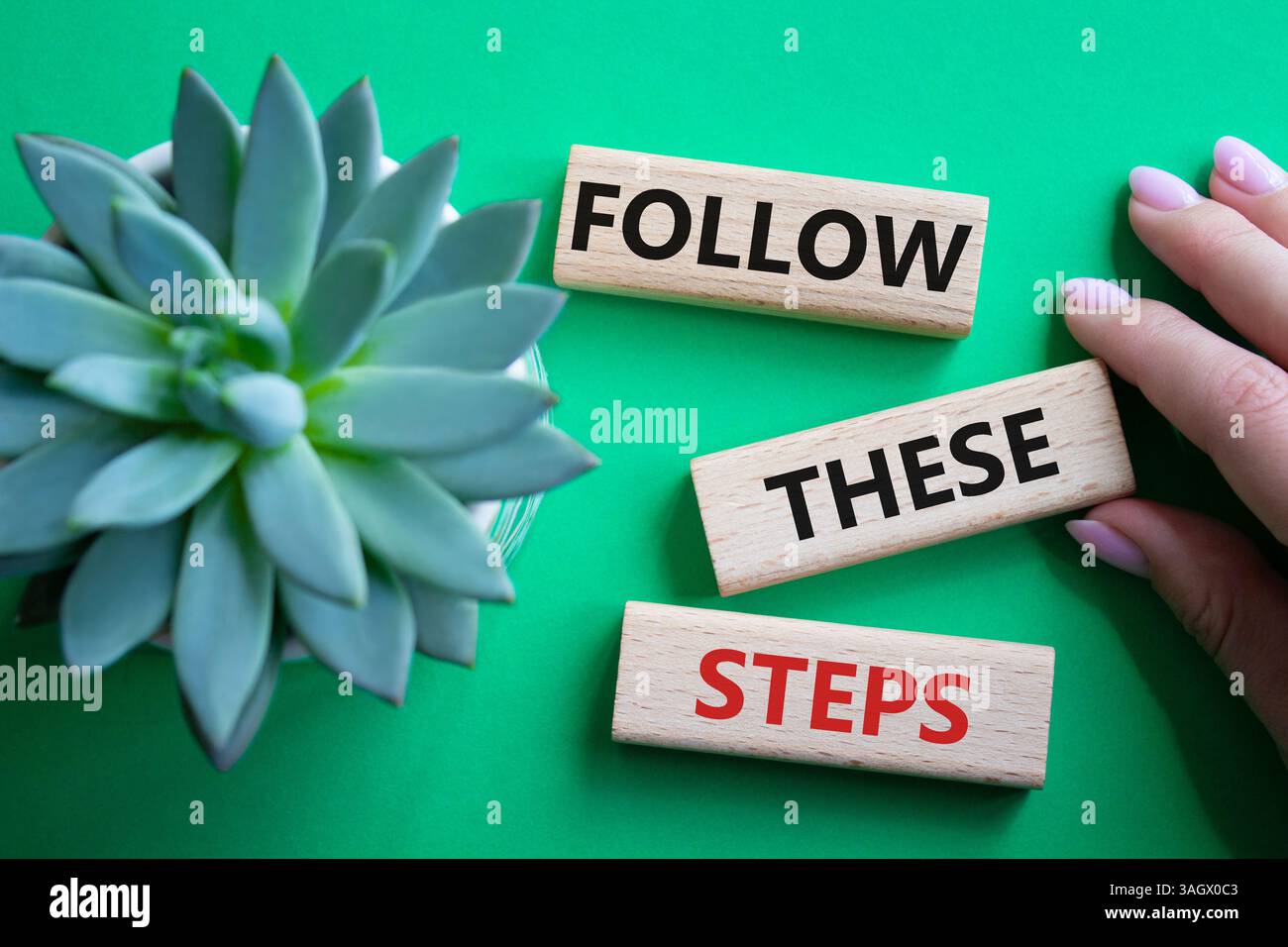 Follow these steps symbol. Wooden blocks with words Follow these steps ...