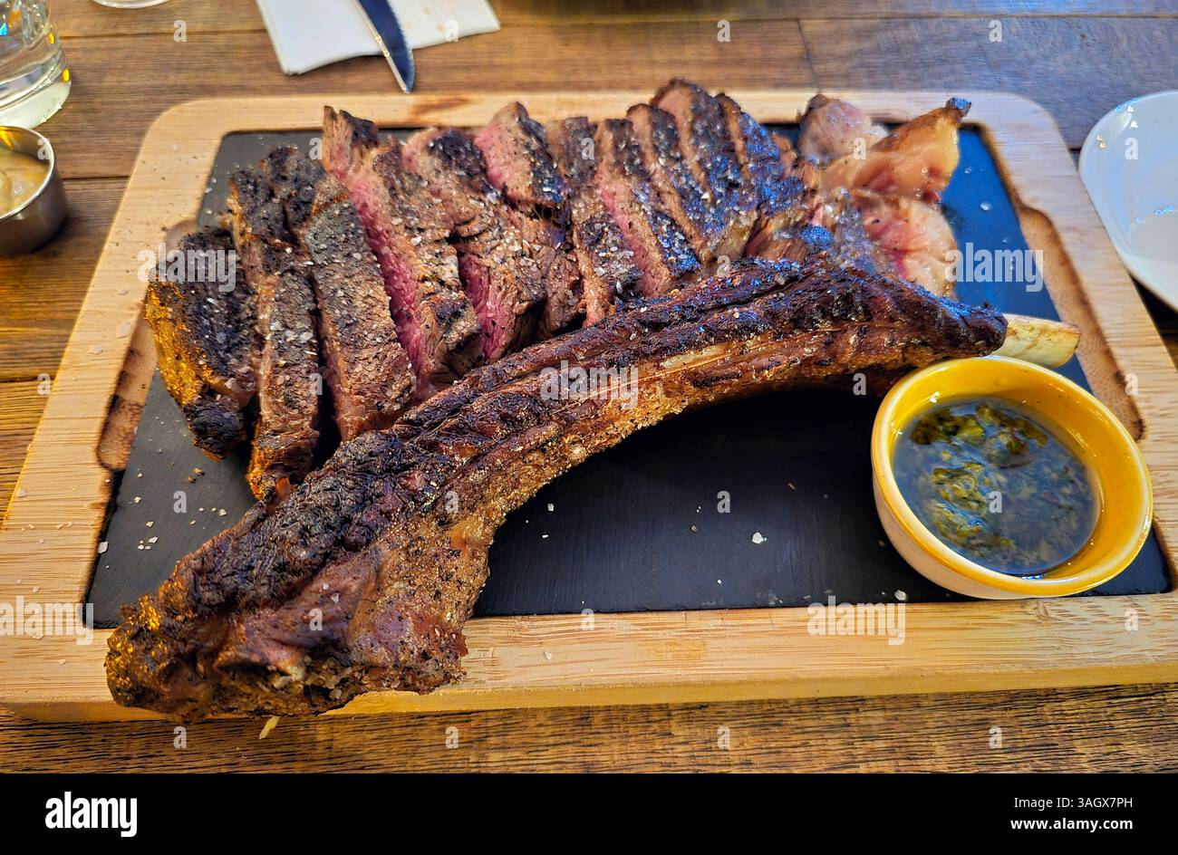 A plate of Rib Steak / Tomahawk steak Stock Photo - Alamy