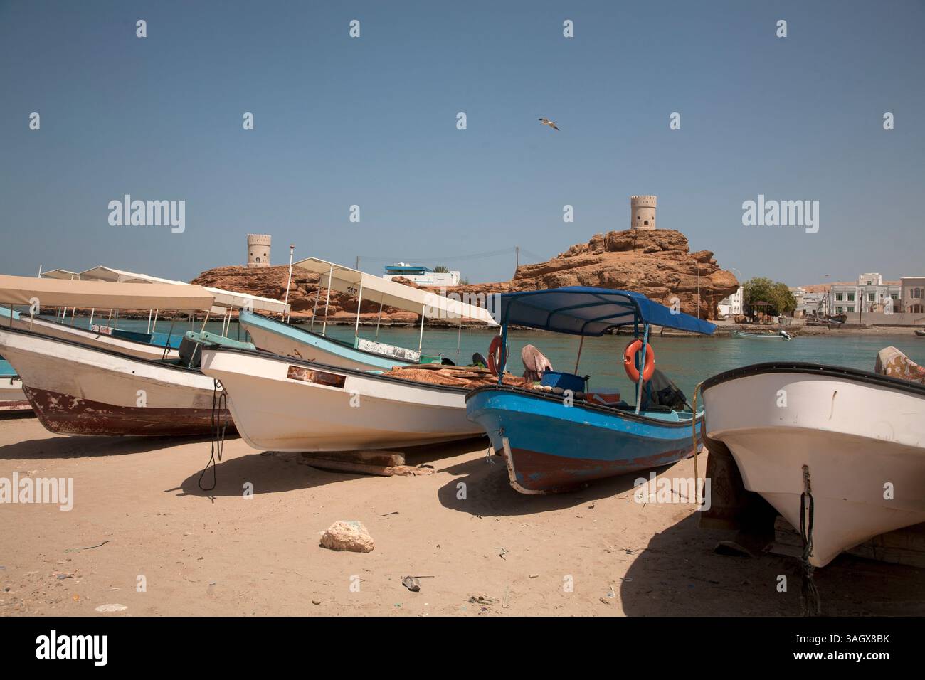 beached fishing boats at sur oman sultanate of oman Stock Photo - Alamy
