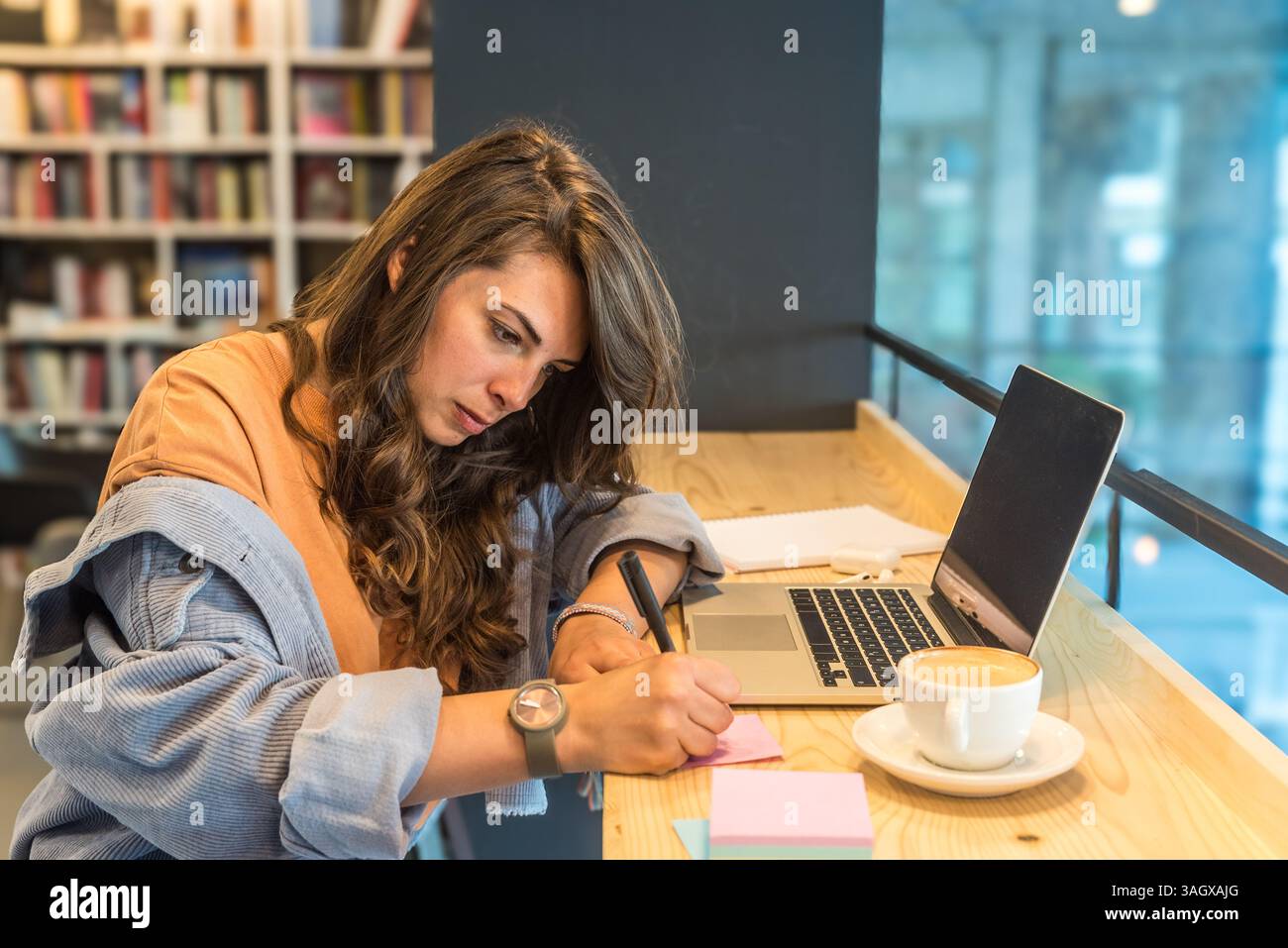 Young freelance business woman, tired and exhausted of work, working ...