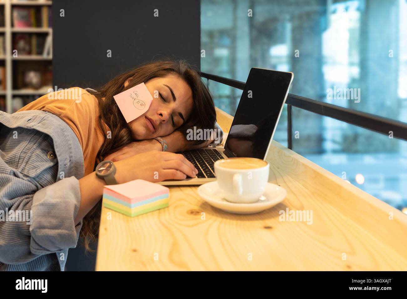 Young freelance business woman, tired and exhausted of work, working ...