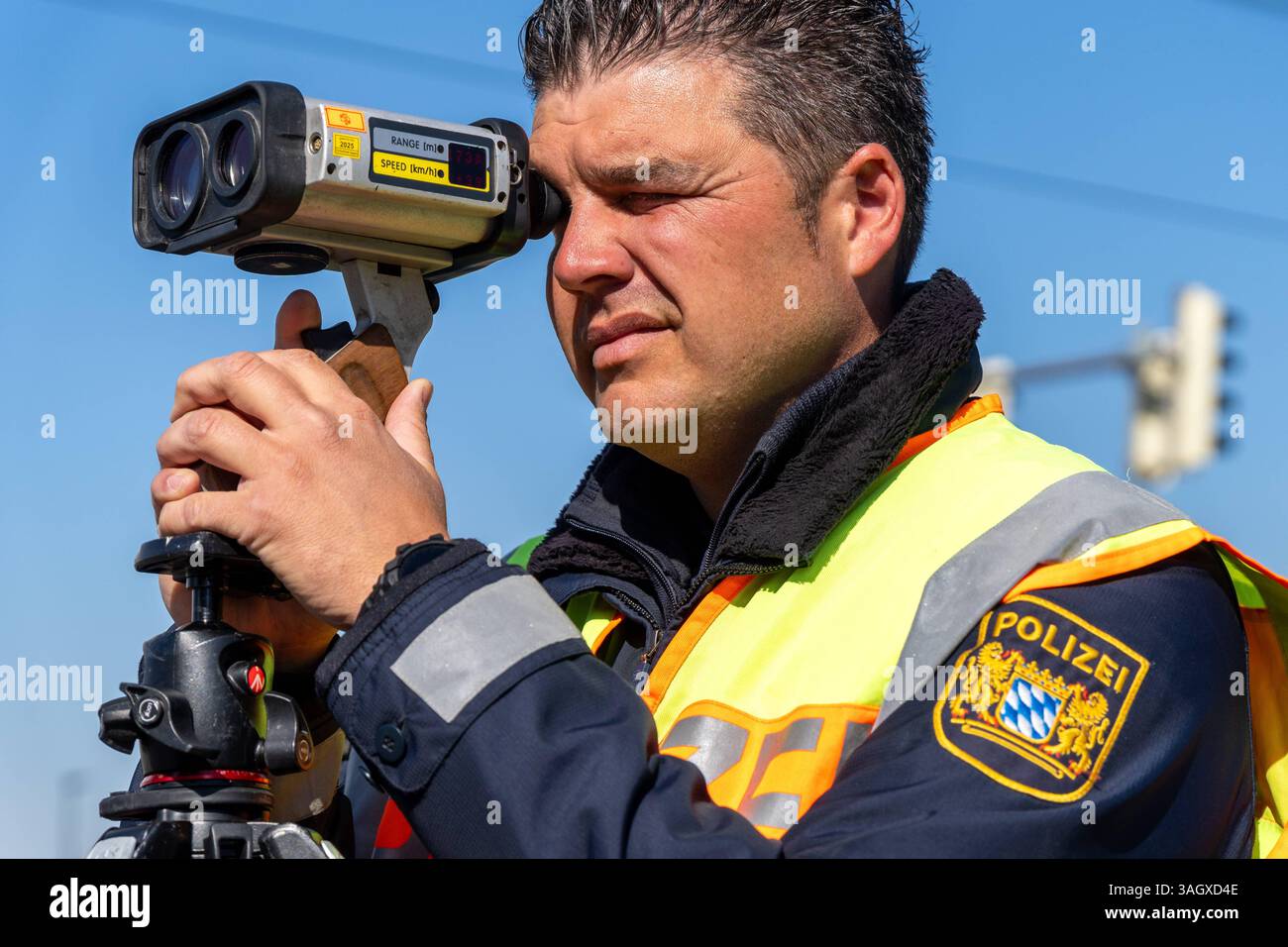 Augsburg, Bavaria, Germany - April 9, 2025: Bavarian police officer ...