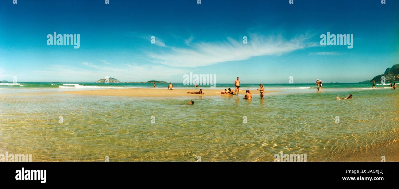 People swimming and enjoying in the ocean, Ipanema beach, Rio de ...