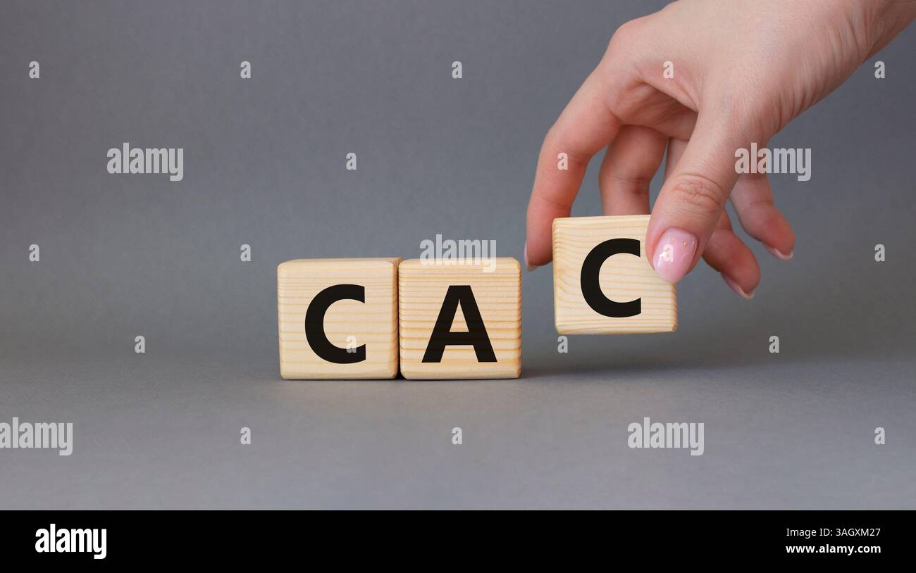 CAC - Customer Acquisition Cost symbol. Wooden cubes with word CAC ...