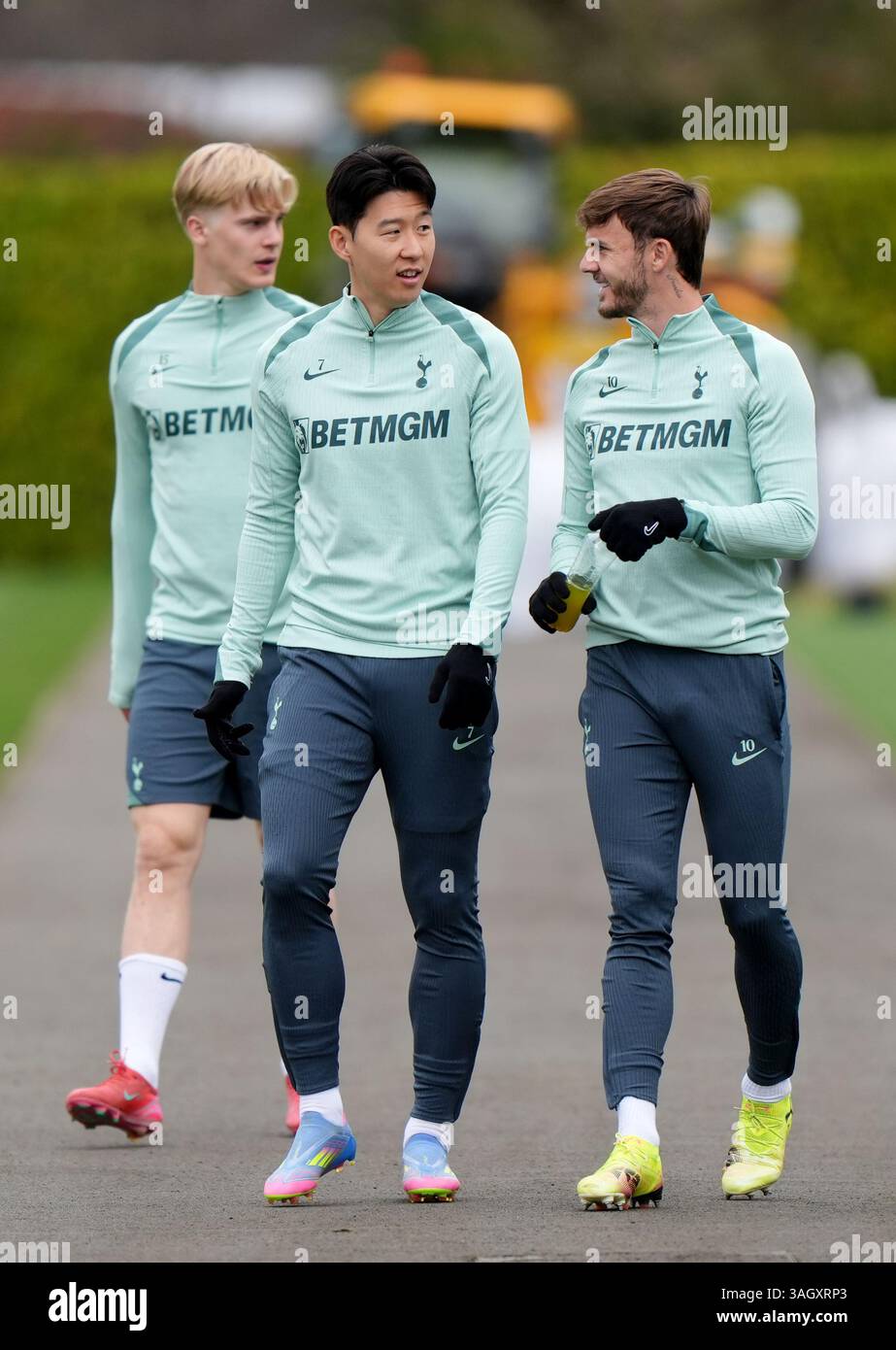 Tottenham Hotspur's Son Heung-Min and James Maddison (right) arrive for ...