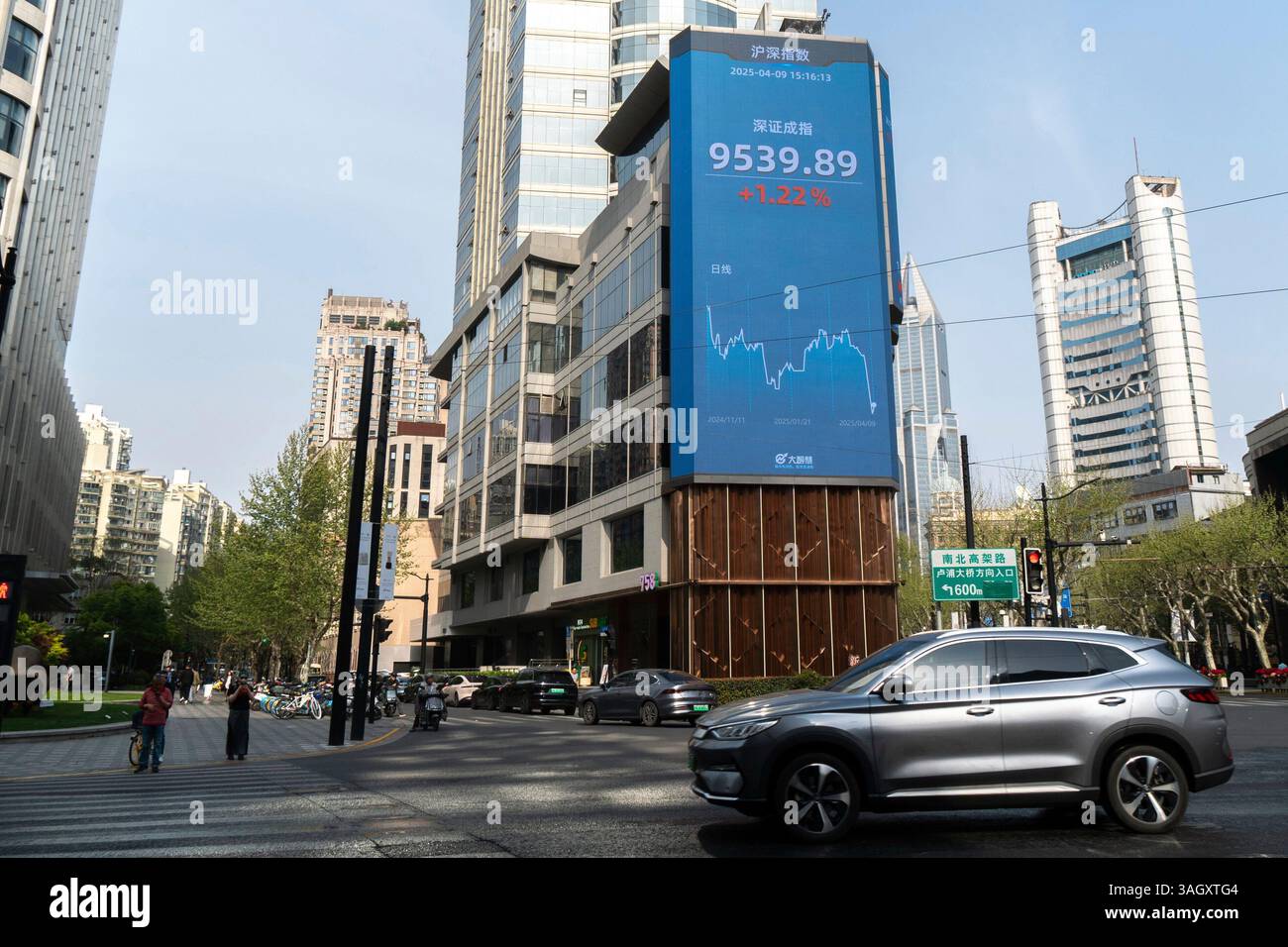 A screen shows the performance of a major Chinese stock index on a ...