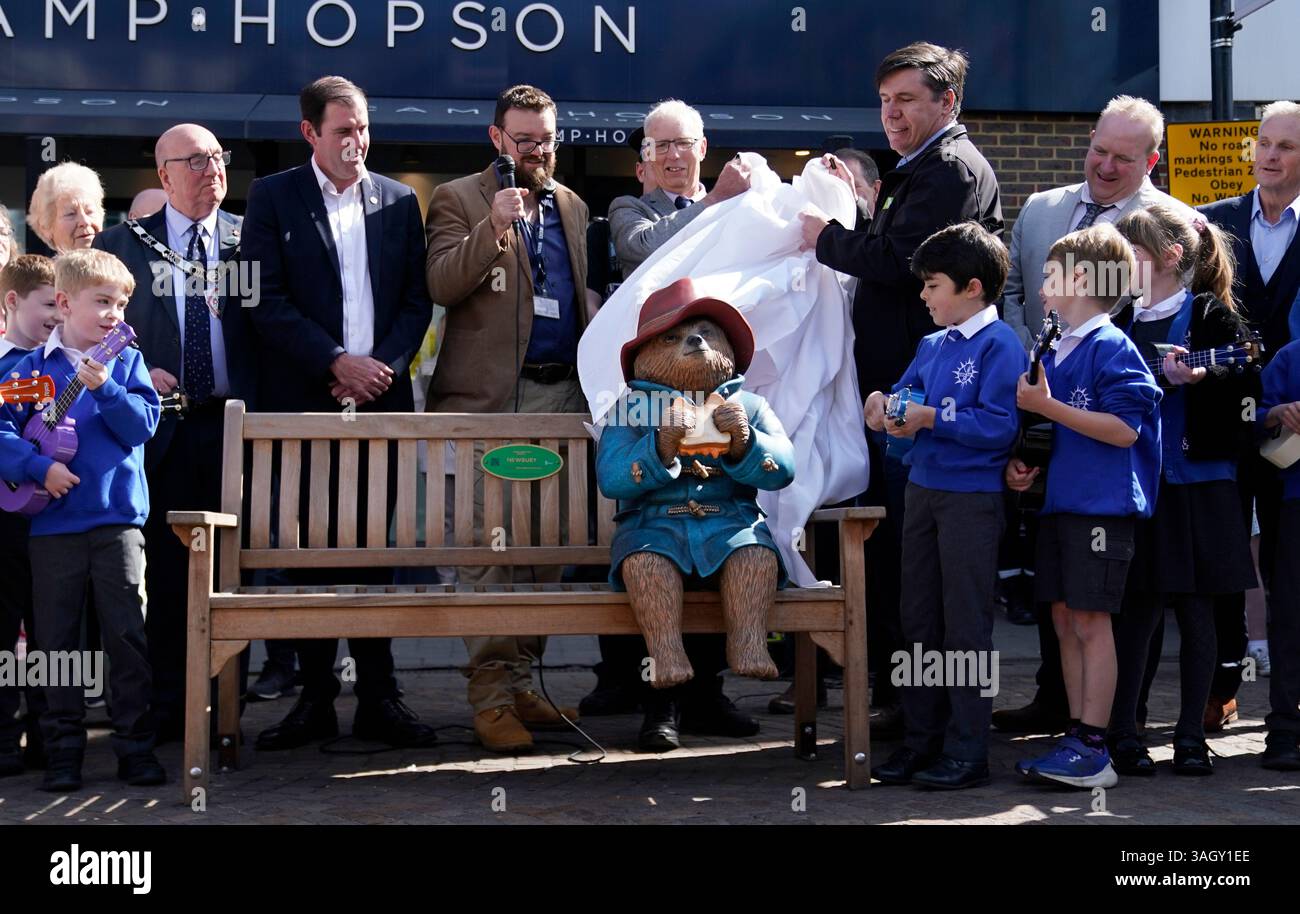 A repaired and repainted statue of Paddington Bear is unveiled after ...