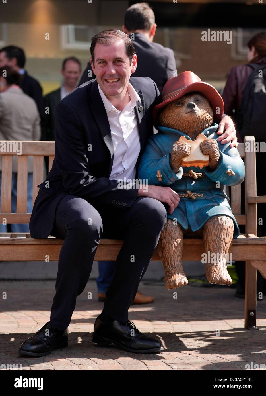 Newbury MP Lee Dillon next to a repaired and repainted statue of ...