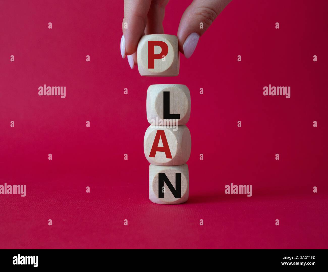 Plan symbol. Concept word Plan on wooden cubes. Businessman hand ...