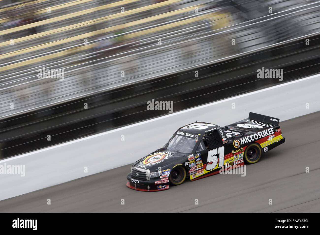 13 June, 2009: Kyle Busch races down the front stretch for the running ...