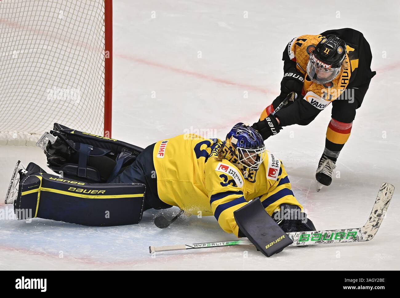 L-R goalkeeper Emma Soderberg (SWE) and Nicola Hadraschek (GER) in ...
