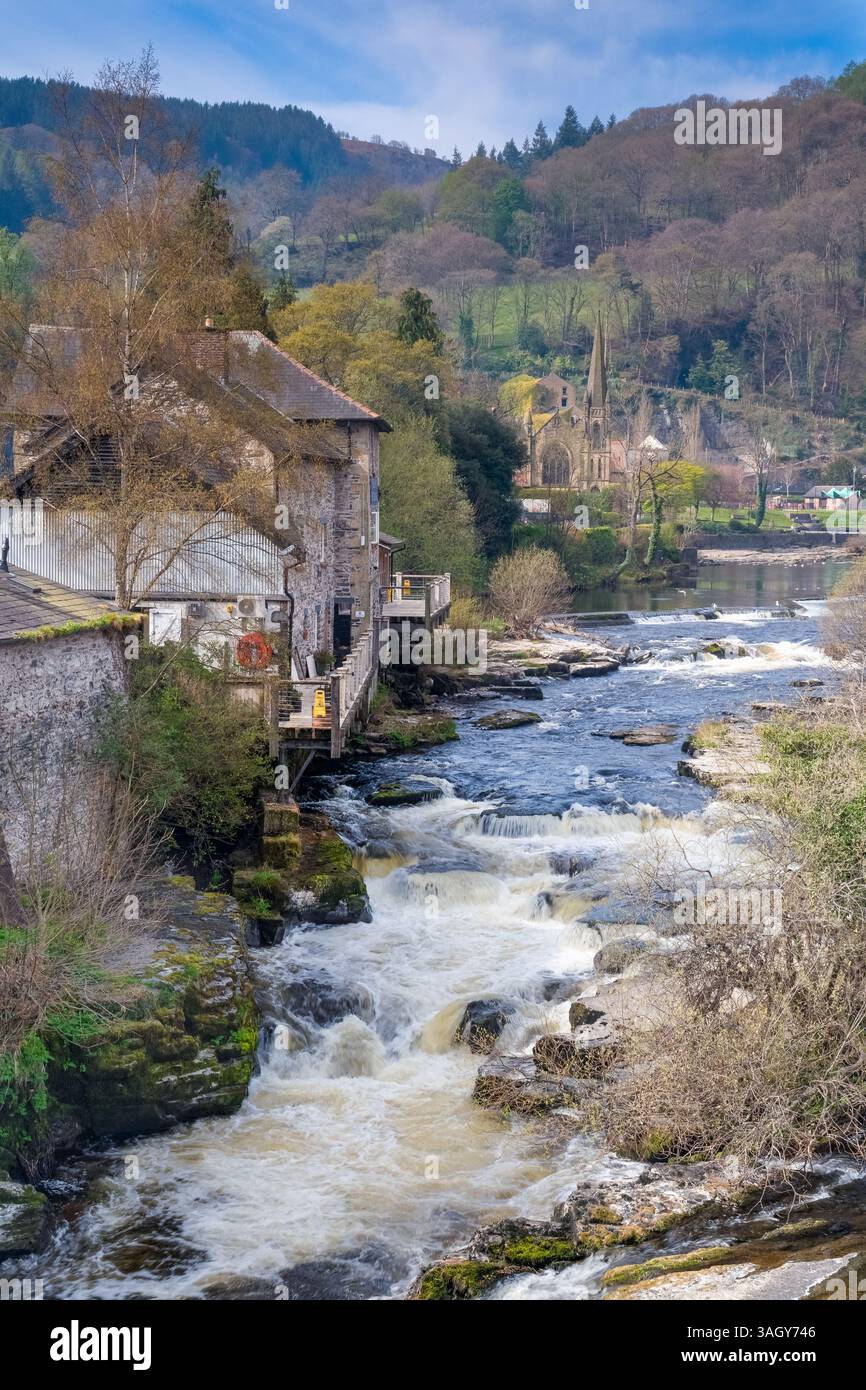 Fast flowing River Dee through the town of Llangollen, Wales in the UK ...