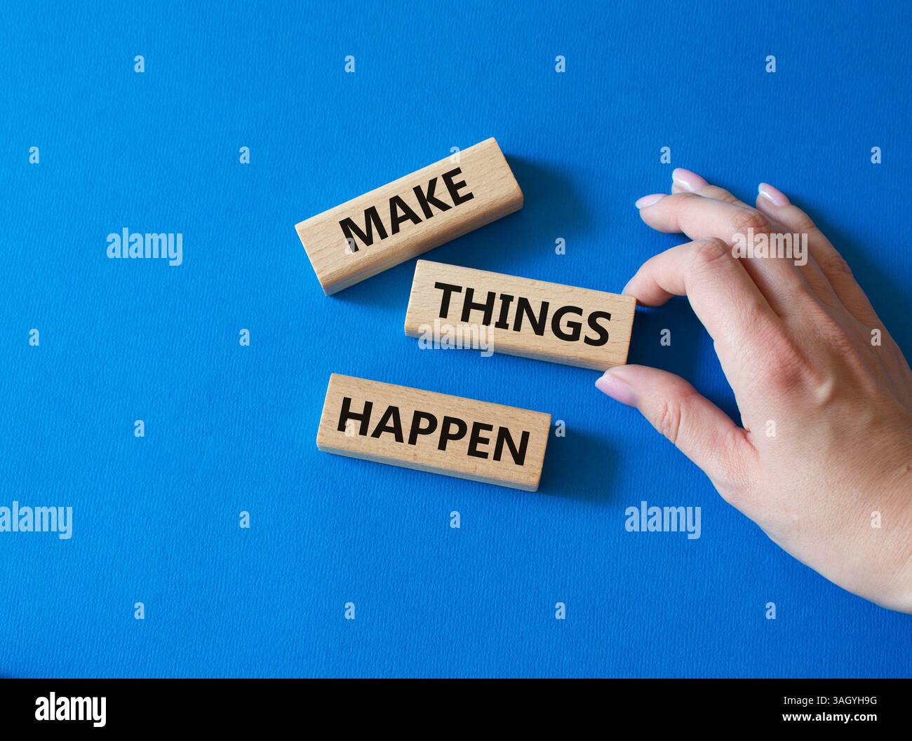 Make things happen symbol. Concept word Make things happen on wooden ...