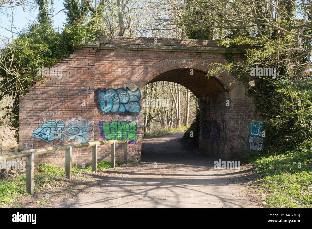 The abutment of the demolished railway bridge that once carried the ...
