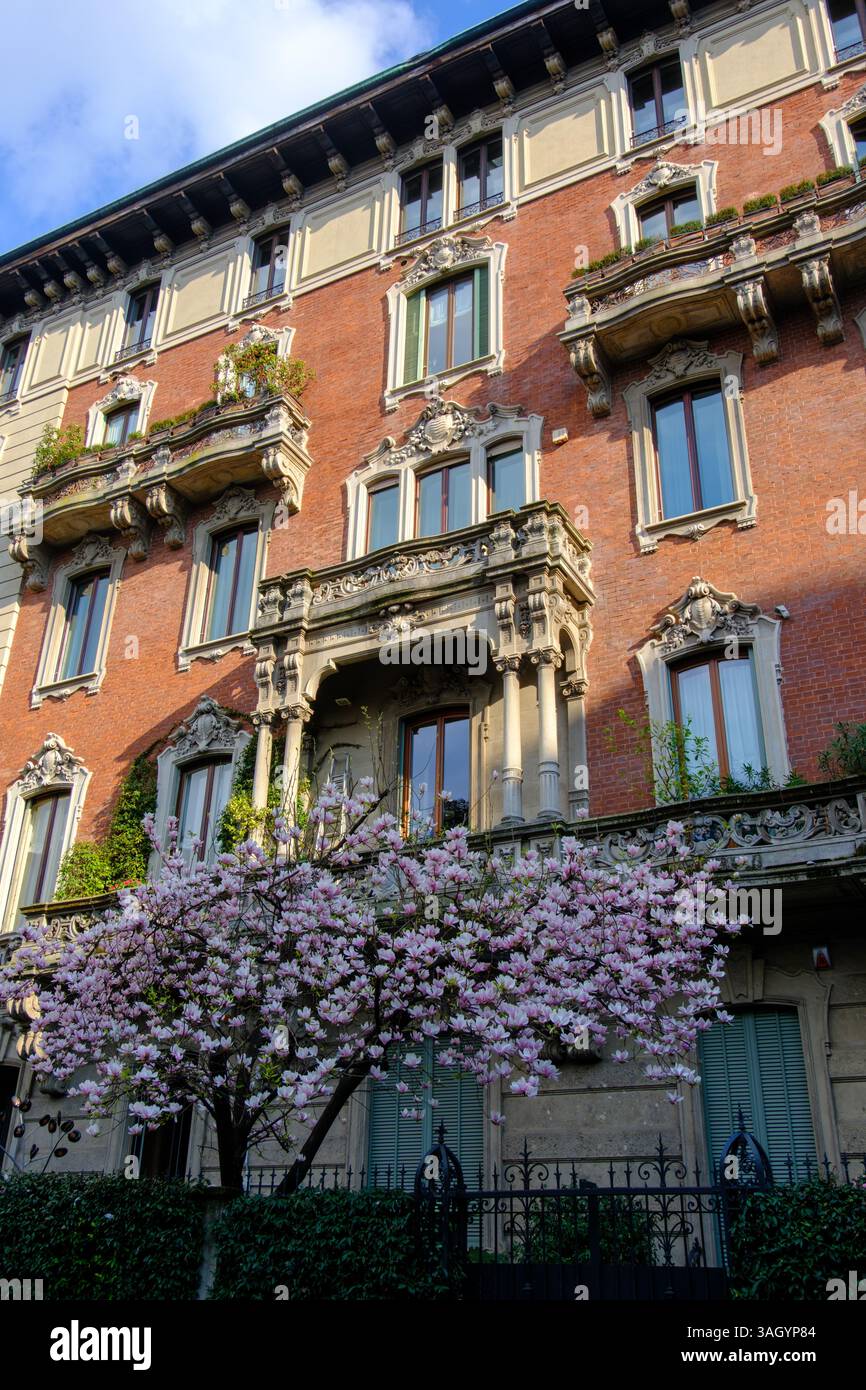 Exterior of old residential building along via Rovani in Milan ...