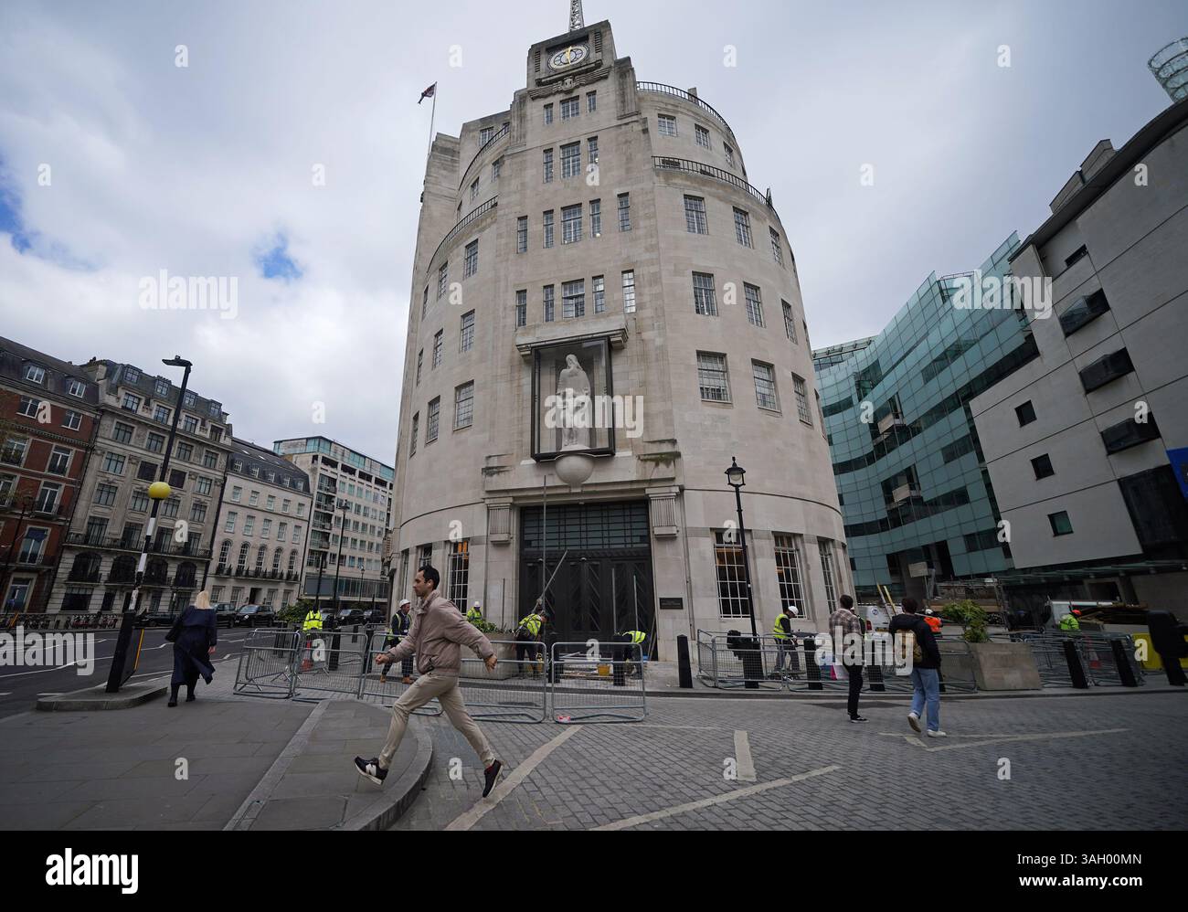 A protective screen in place around the controversial sculpture, which ...