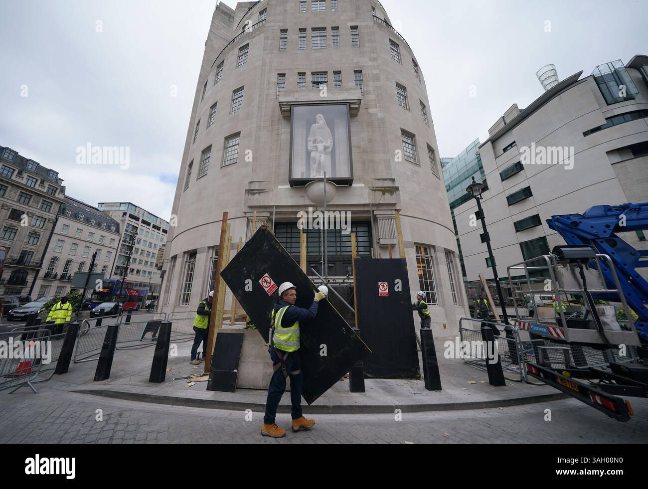 A protective screen in place around the controversial sculpture, which ...