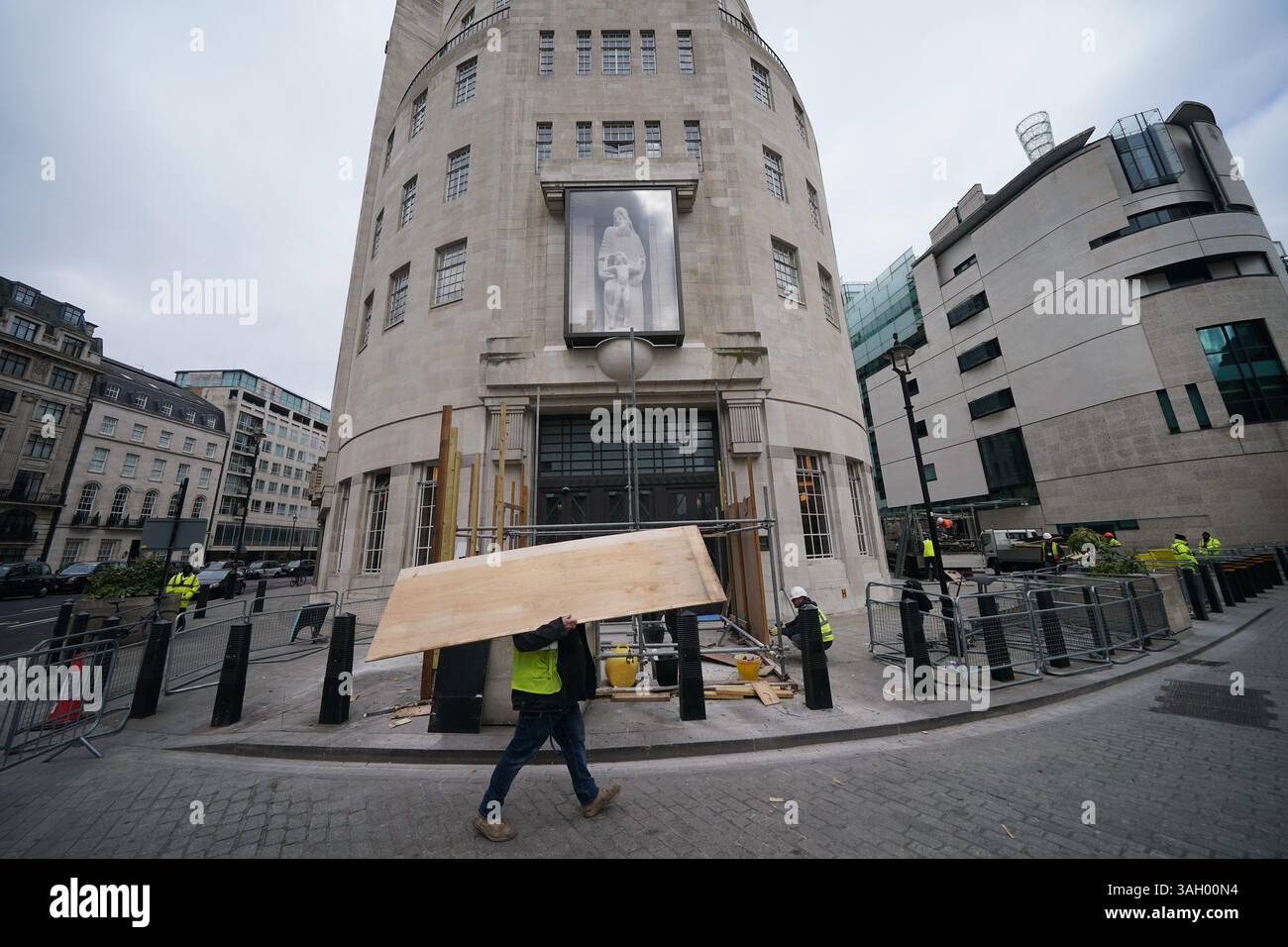 A protective screen in place around the controversial sculpture, which ...