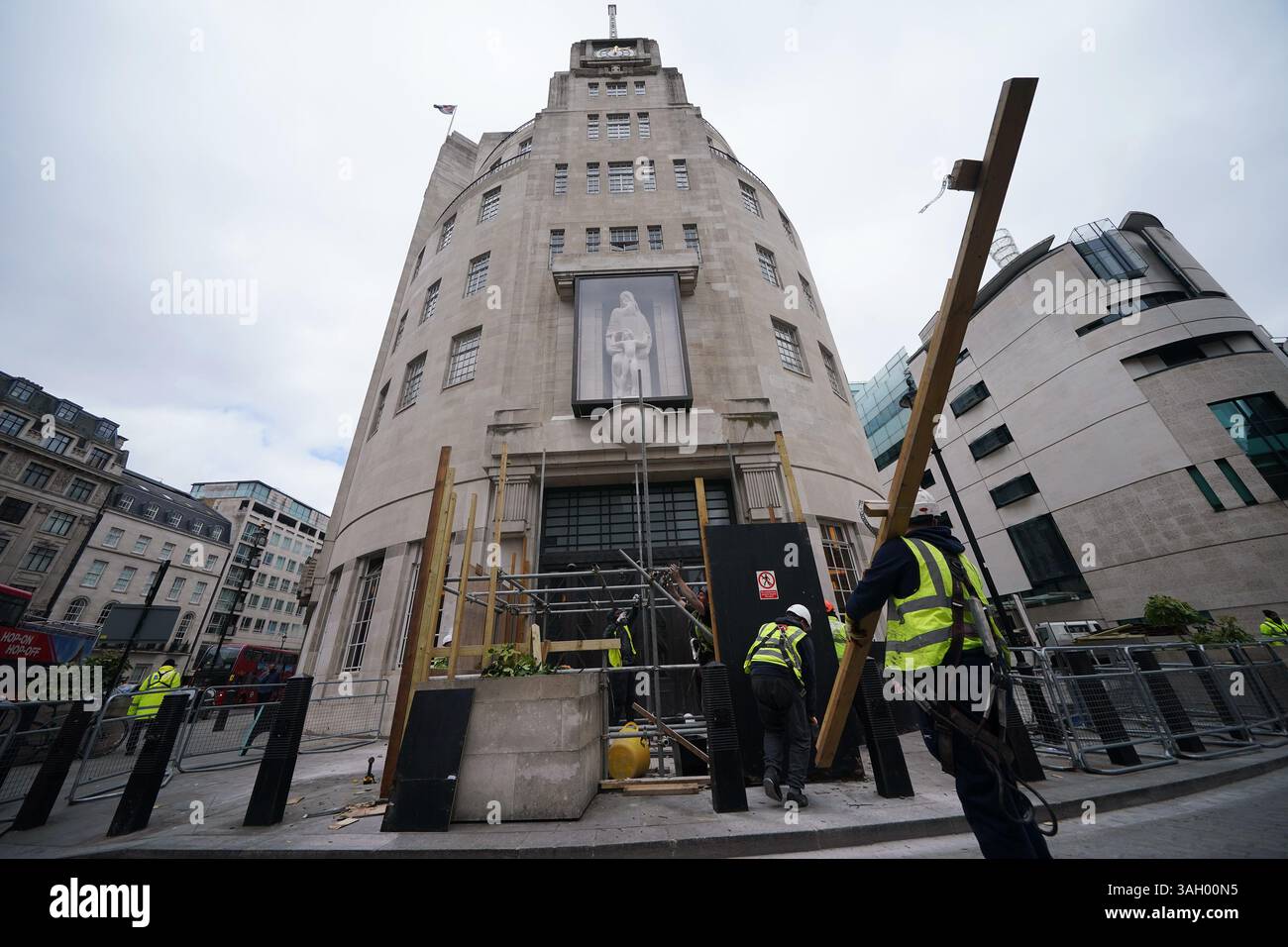 A protective screen in place around the controversial sculpture, which ...