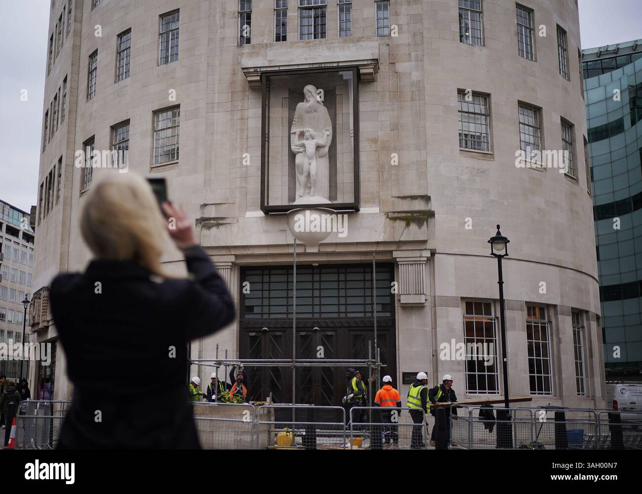 A protective screen in place around the controversial sculpture, which ...