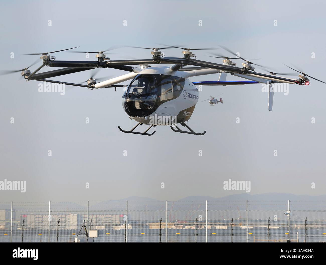 A flying car flies over venue for Expo 2025 Osaka, Kansai, Japan at ...