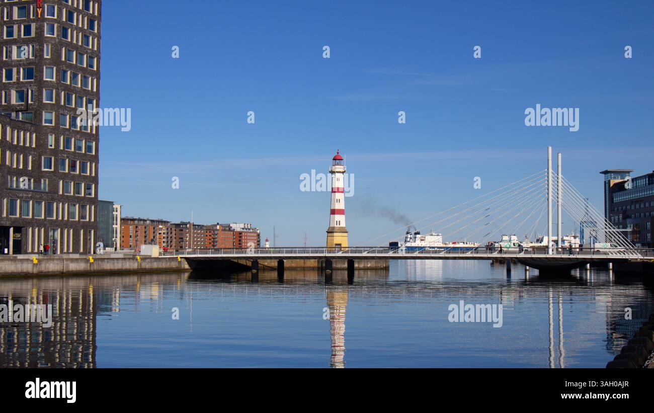 Lighthouse in the city of Malmo, Sweden, located near the sea with ...