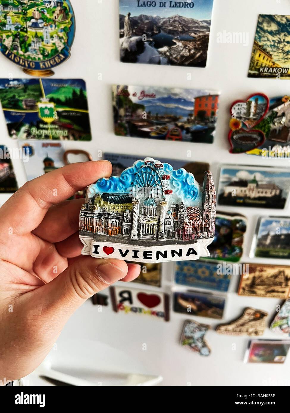 Kyiv, Ukraine - April 08, 2025: A Vienna magnet souvenir shown in front ...
