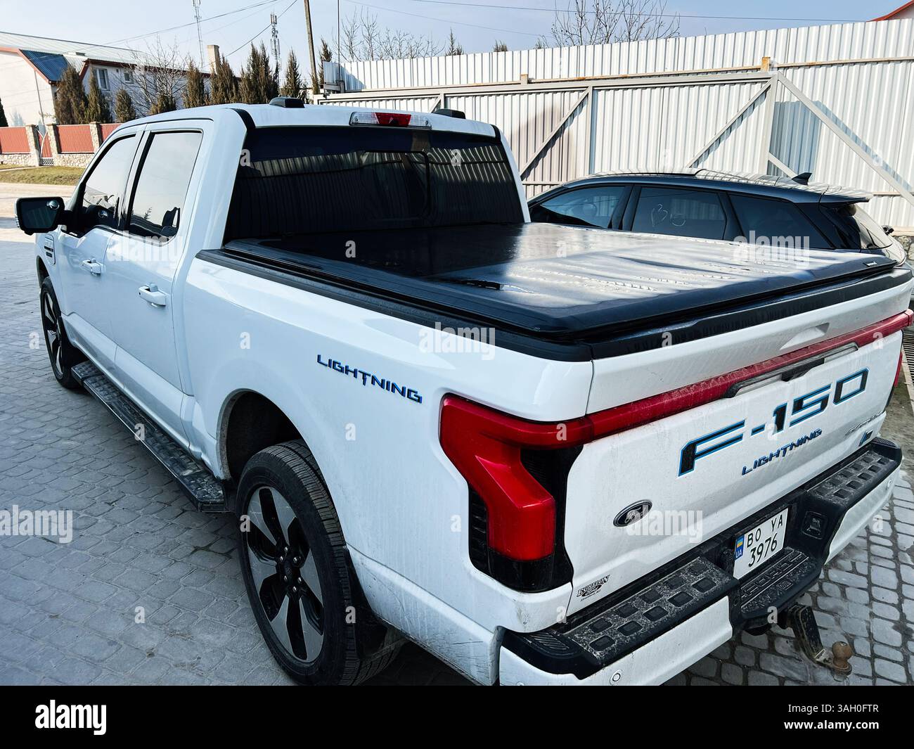 Kyiv, Ukraine - April 08, 2025: White Ford F-150 Lightning pickup truck ...