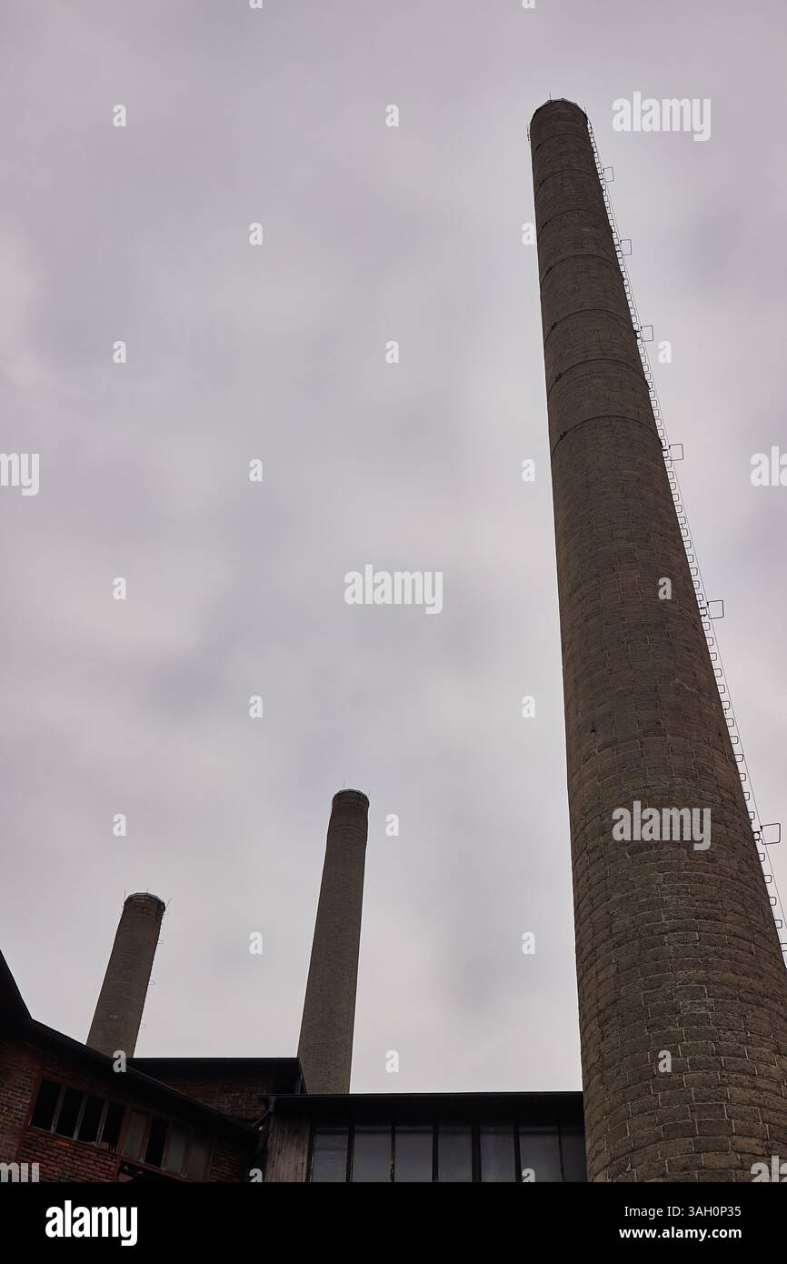 Chimneys if an industrial facility Stock Photo - Alamy