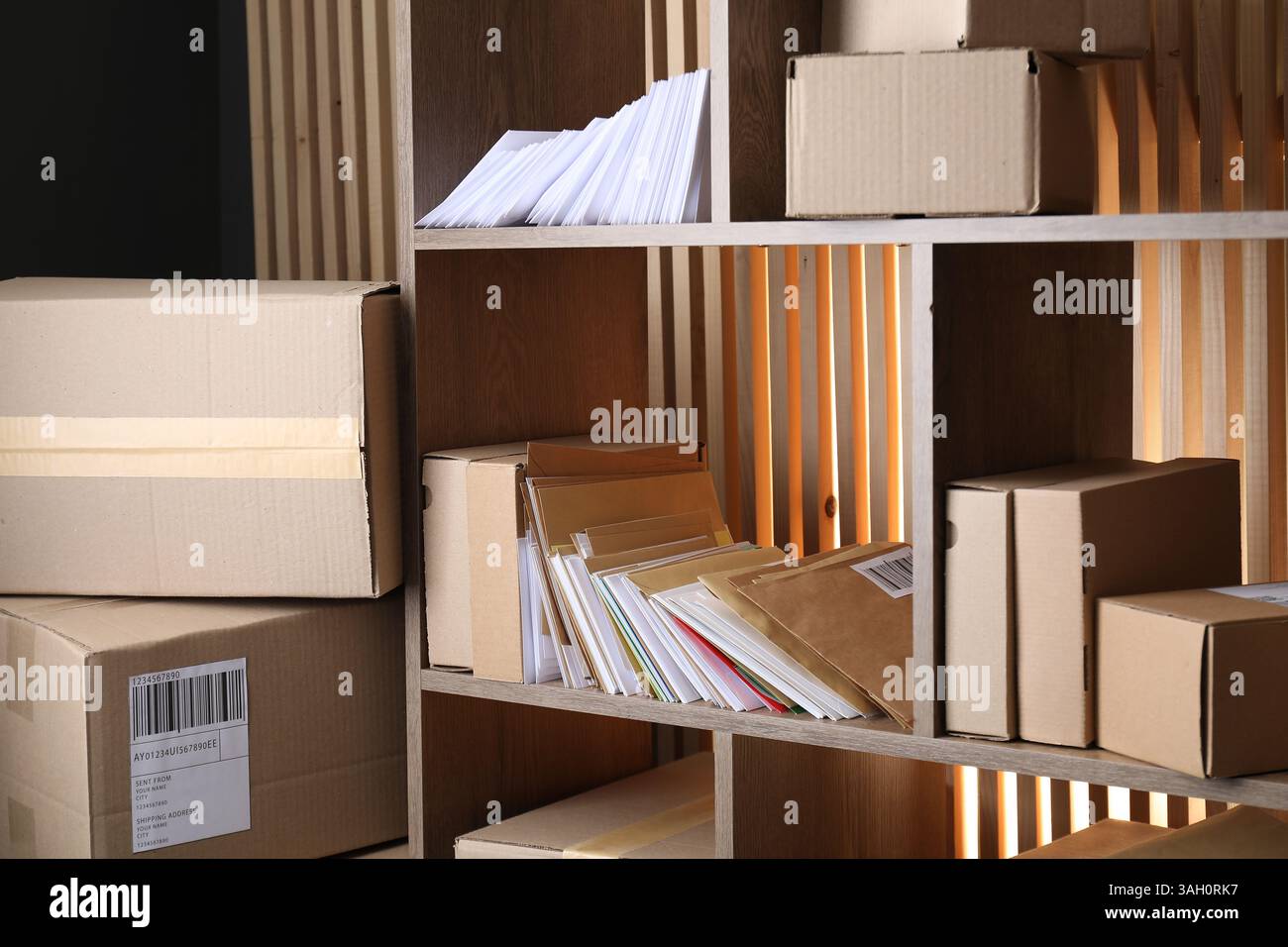 Different paper envelopes and parcels in post office Stock Photo - Alamy