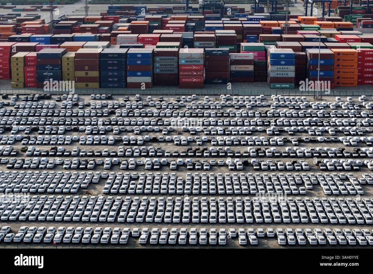 New Volvo vehicles parked near containers as waiting for shipment at ...