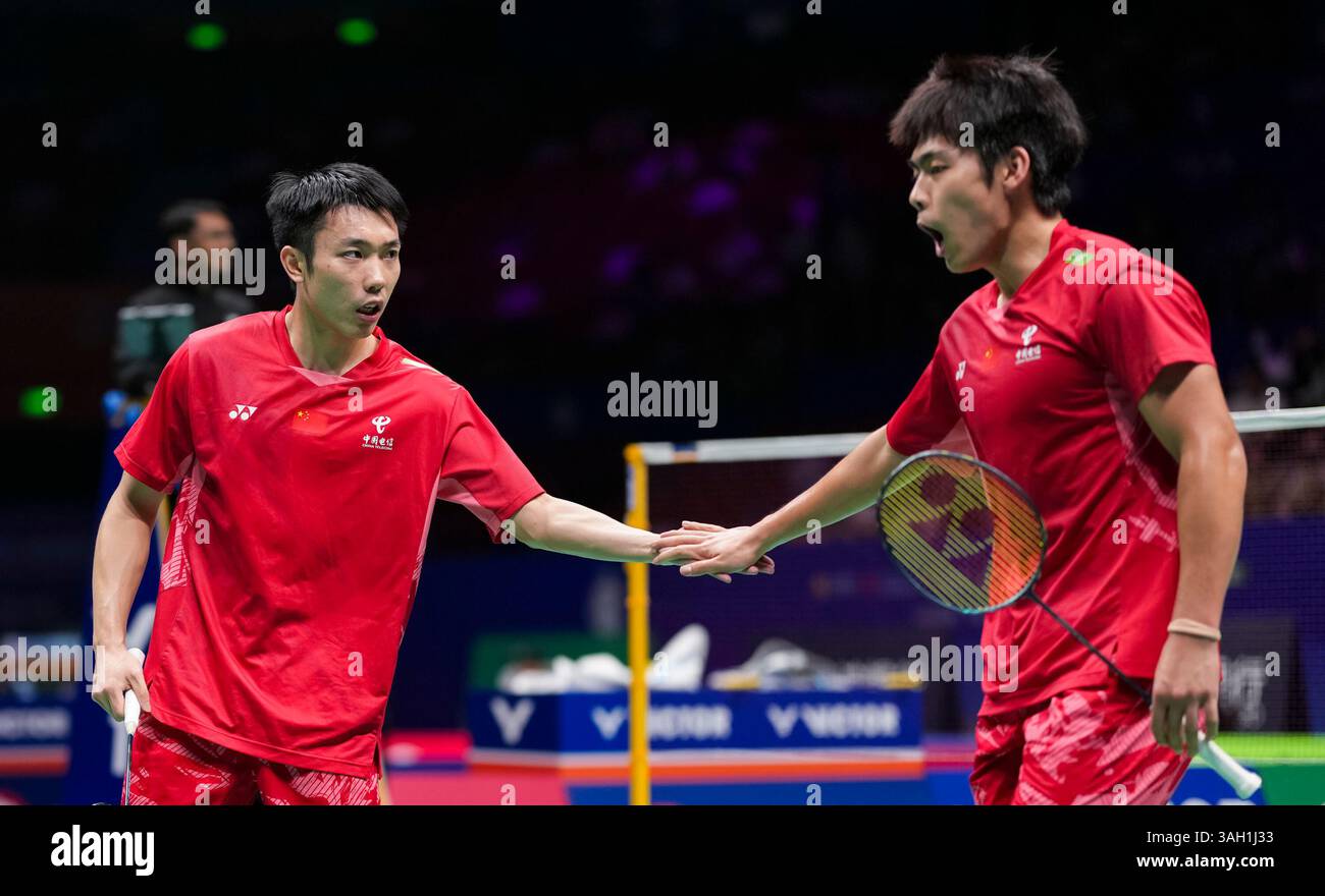 (250409) -- NINGBO, April 9, 2025 (Xinhua) -- Xie Haonan (R)/Zeng ...