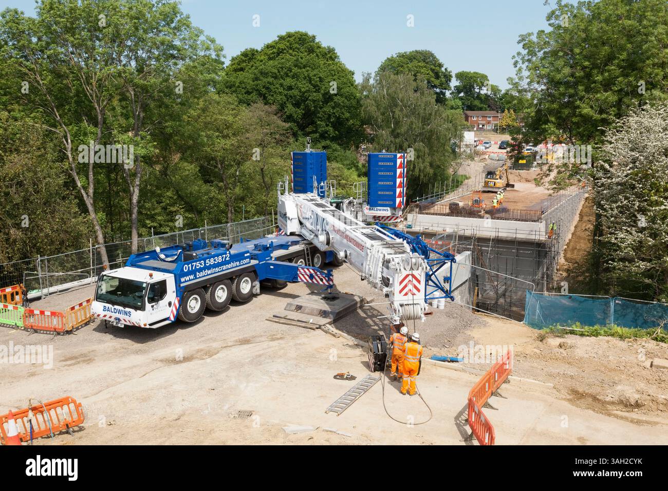 A heavy-lift Baldwins crane lifting concrete beams into place on a new ...