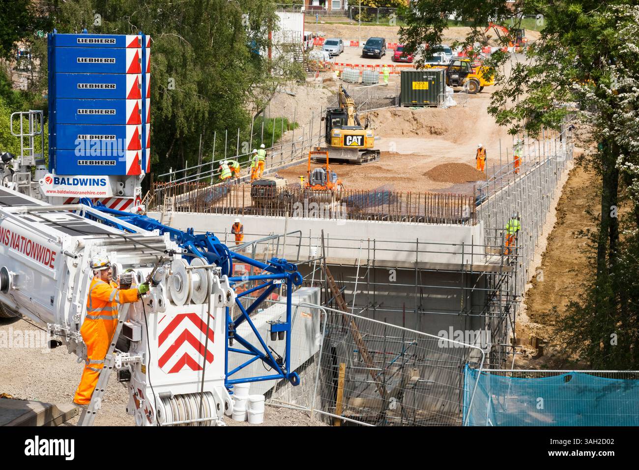A heavy-lift Baldwins crane lifting concrete beams into place on a new ...