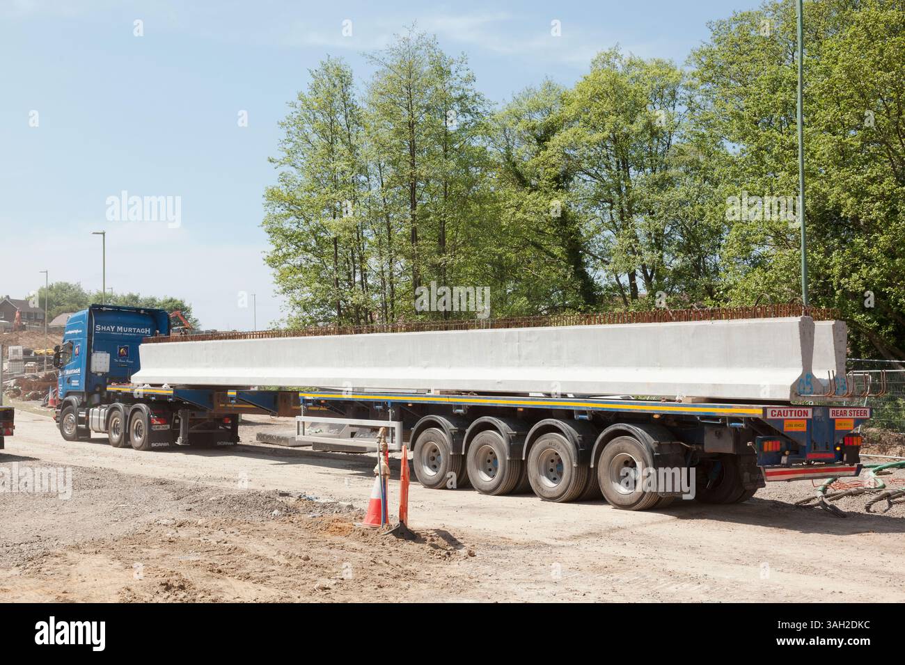 A heavy-lift Baldwins crane lifting concrete beams into place on a new ...