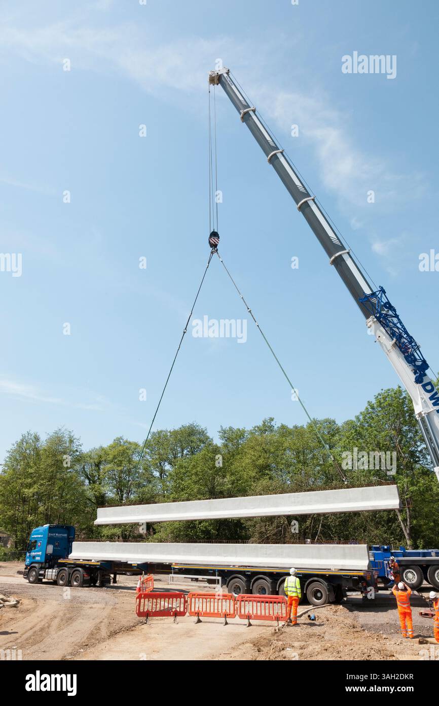 A heavy-lift Baldwins crane lifting concrete beams into place on a new ...