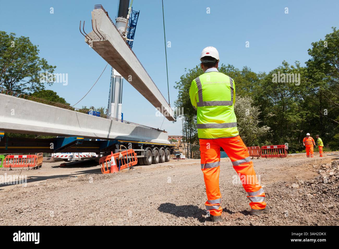 A heavy-lift Baldwins crane lifting concrete beams into place on a new ...