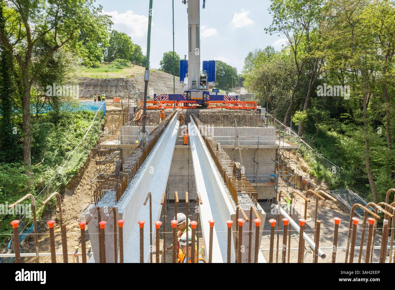 A heavy-lift Baldwins crane lifting concrete beams into place on a new ...