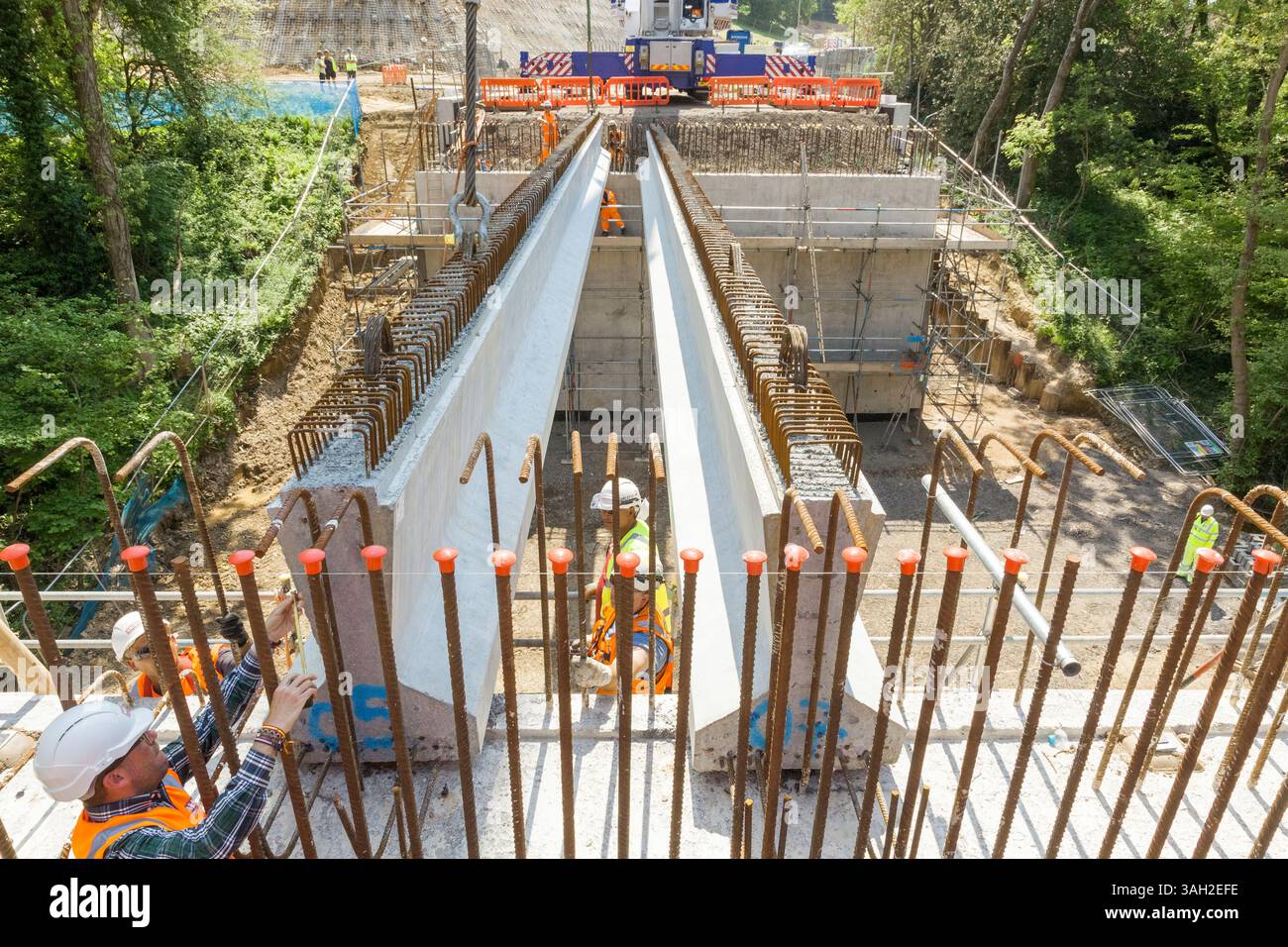A heavy-lift Baldwins crane lifting concrete beams into place on a new ...
